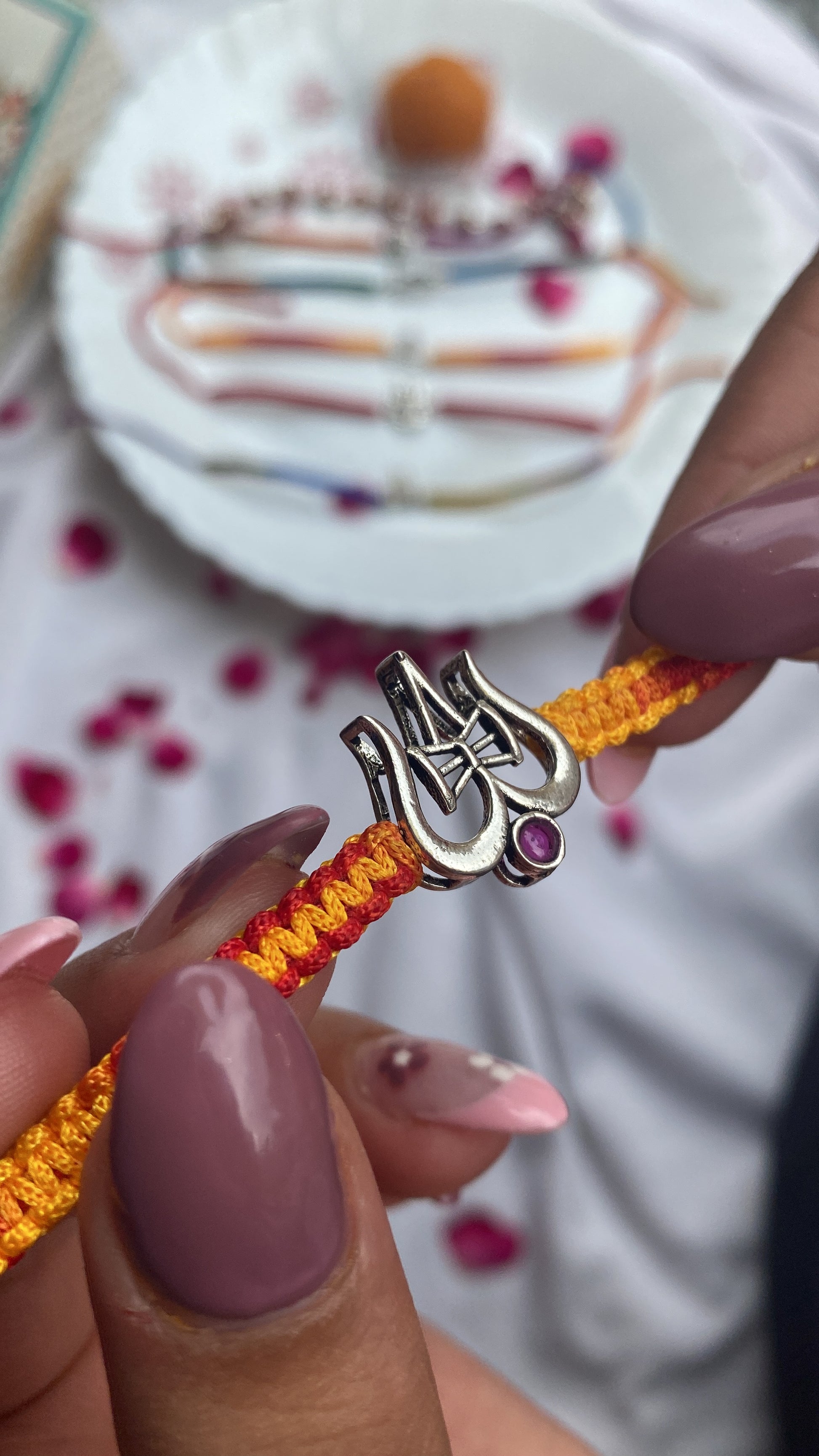 Shiva trishul rakhi – KIWI BLOSSOM
